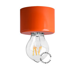 This orange lamp has a super-modern line. take it home | zangra
